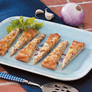 Garlic Pizza Wedges Recipe | Taste of Home